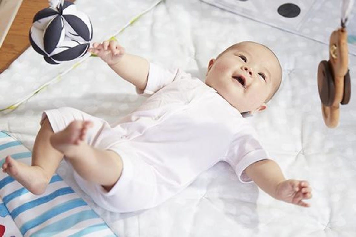 When your baby kicks, they're learning to roll over | Lovevery